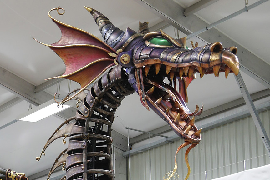 First photo: Fire-breathing dragon parade float arrives at Disneyland Paris